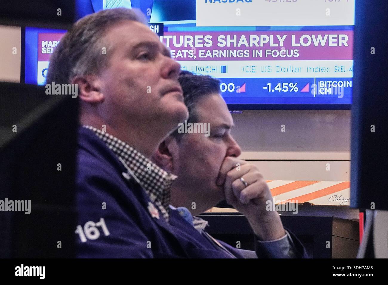 Thomas McCauley, left, and Terrance McCauley work on the floor of the ...