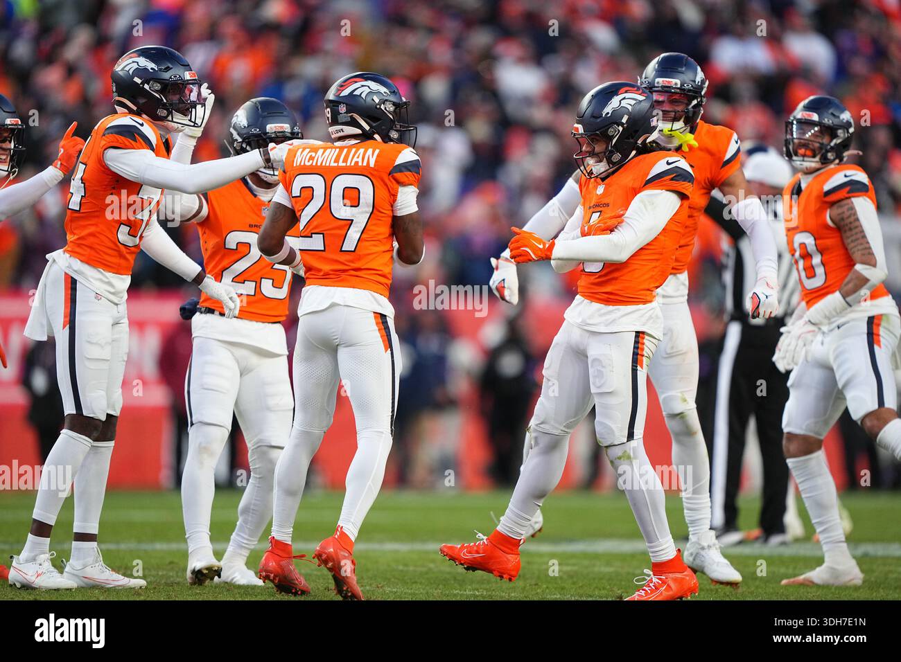 Denver Broncos safety P.J. Locke (6) celebrates his interception with ...