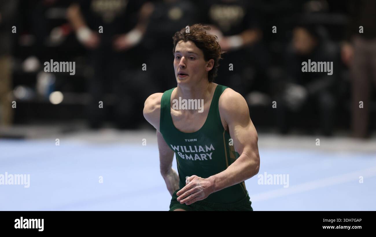 William & Mary's Luke Tully competes during an NCAA gymnastics meet on ...