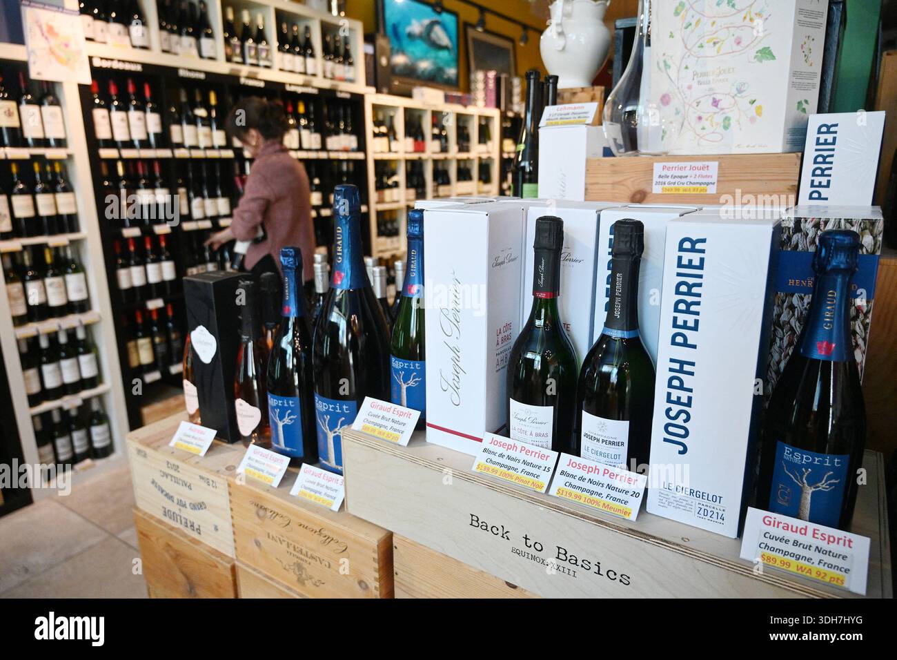 Washington, United States. 20th Jan, 2026. Bottles of French wine are ...
