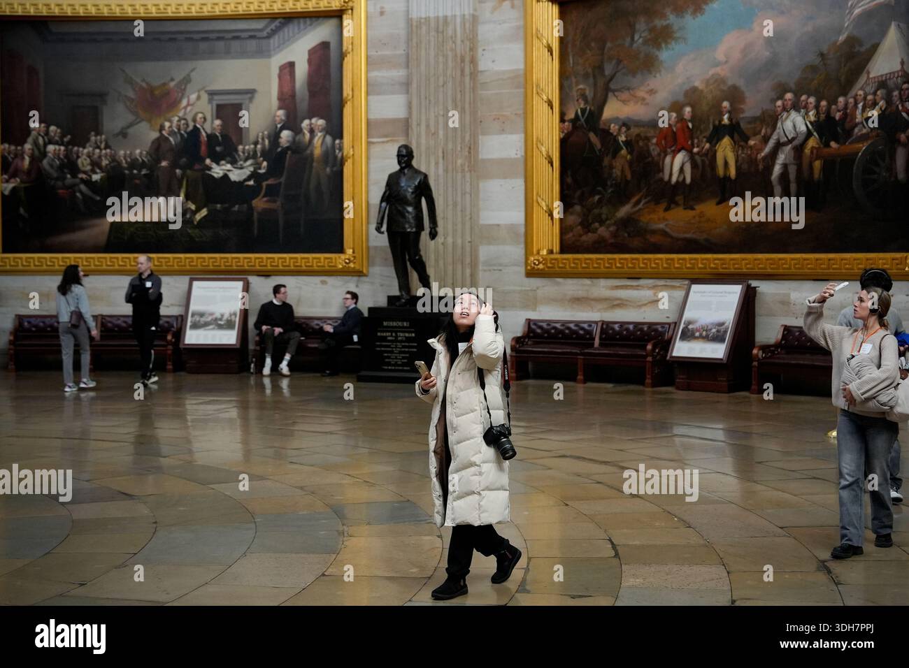 Tour groups visit the U.S. Capitol Rotunda, where President Donald ...