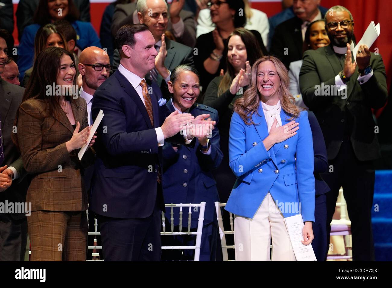 People stand and applaud for New Jersey Governor Mikie Sherrill during ...