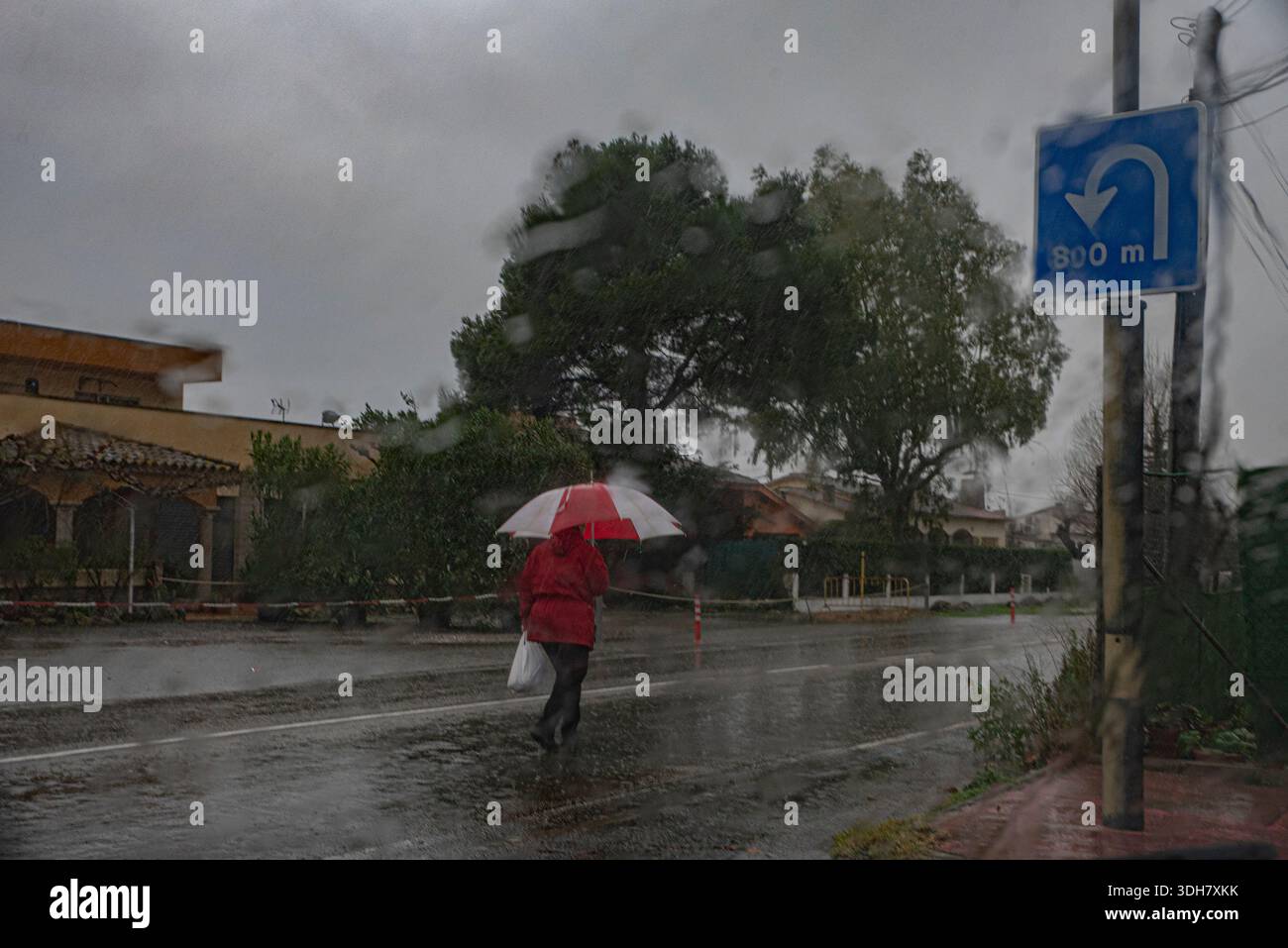 Pals, Girona, Spain. 20th Jan, 2026. A woman walks in the middle of the ...