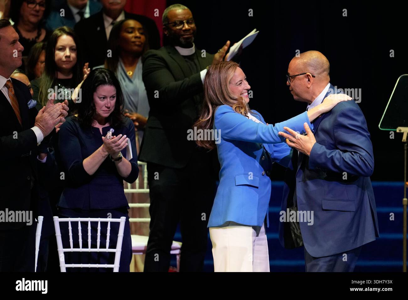 New Jersey Gov. Mikie Sherrill embraces Lt. Gov. Dale Caldwell during ...