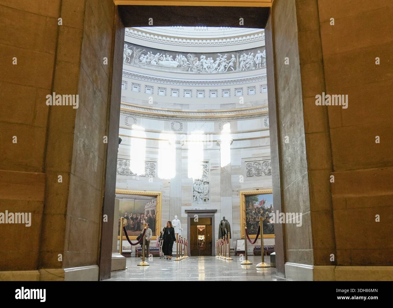 Tour groups visit the U.S. Capitol Rotunda, where President Donald ...