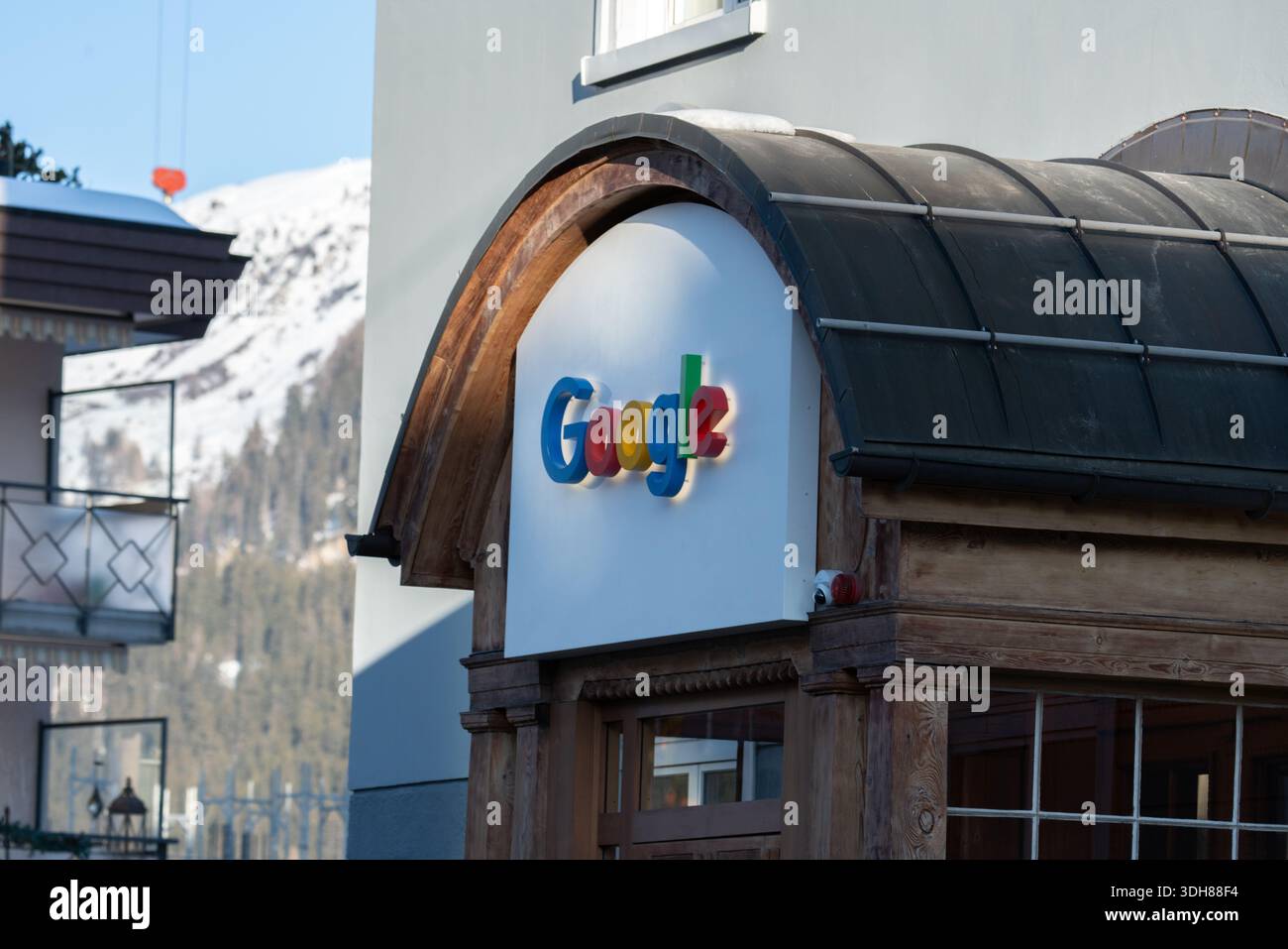 Google logo prominently displayed on a building in a european mountain ...