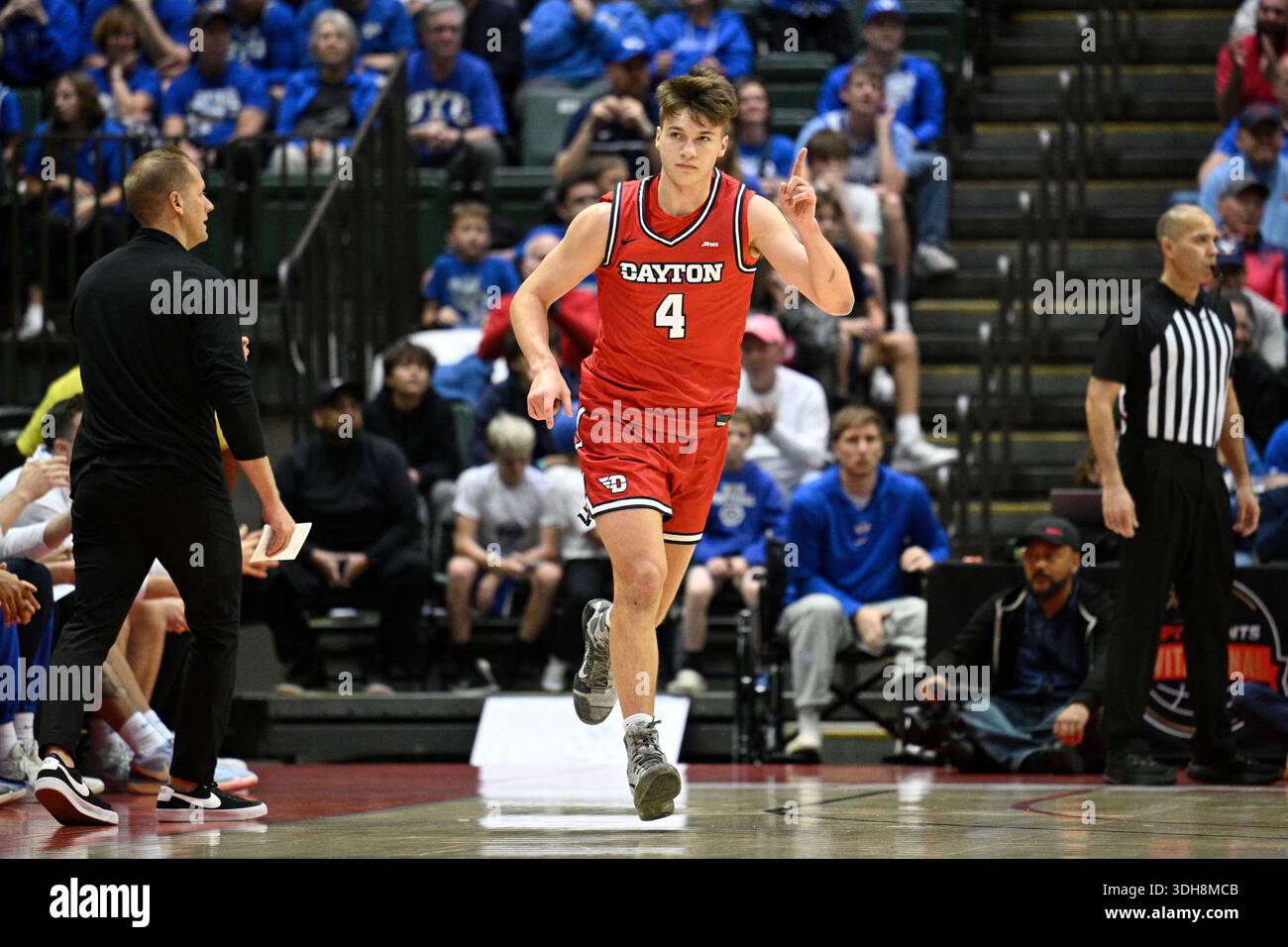 Dayton guard Jordan Derkack (4) reacts after scoring a 3-point basket ...