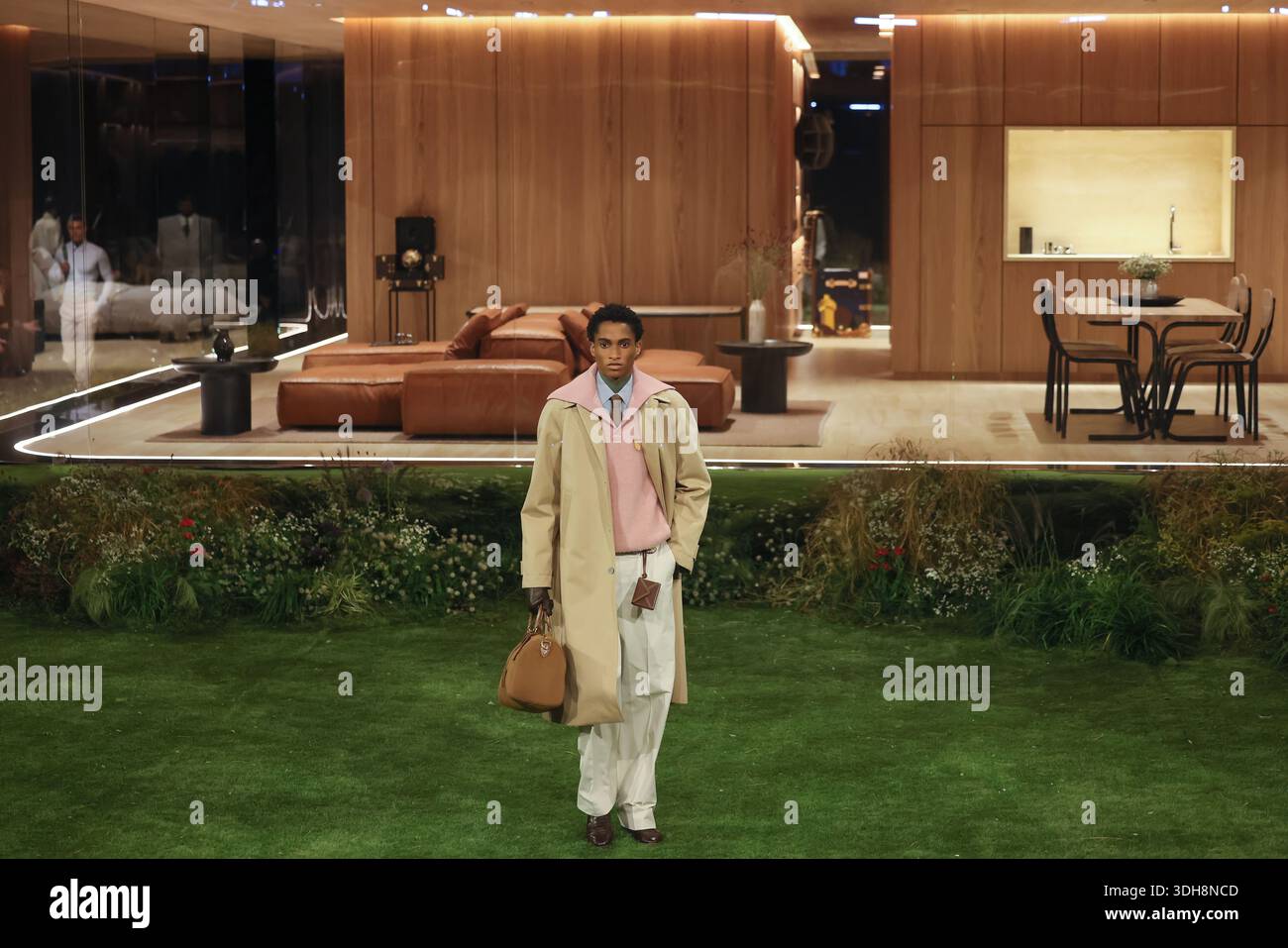 A model wears a creation as part of the Louis Vuitton Fall/Winter 2026 ...