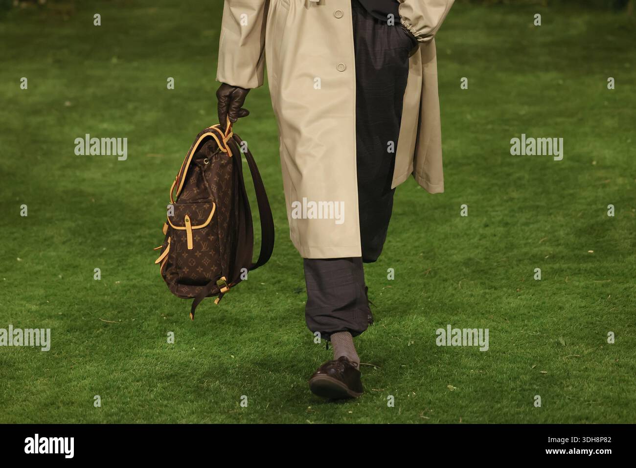 A model wears a creation as part of the Louis Vuitton Fall/Winter 2026 ...