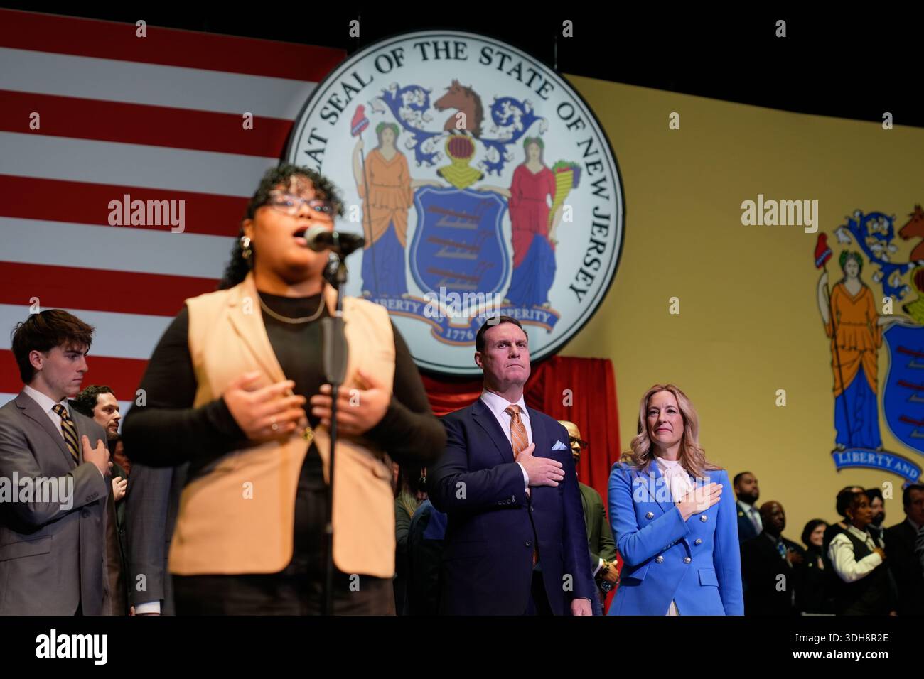 New Jersey Governor Mikie Sherrill and her husband Jason Hedberg stand ...