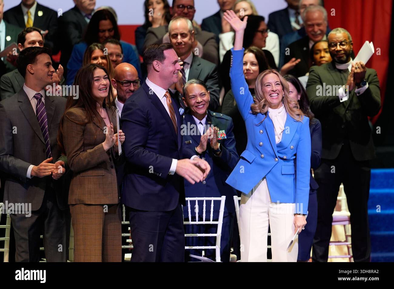 People stand and applaud for New Jersey Governor Mikie Sherrill during ...