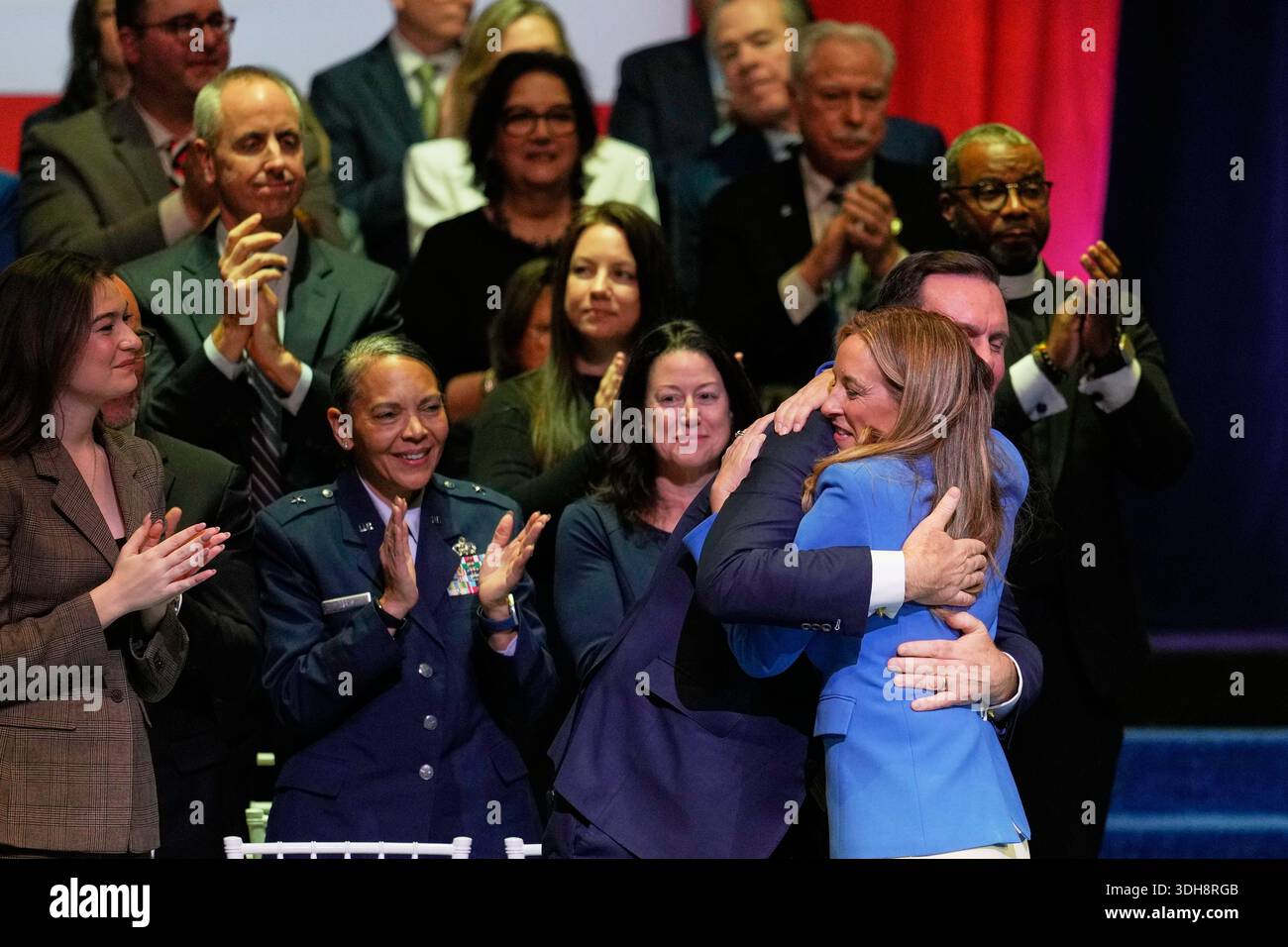 New Jersey Governor Mikie Sherrill hugs her husband Jason Hedberg ...