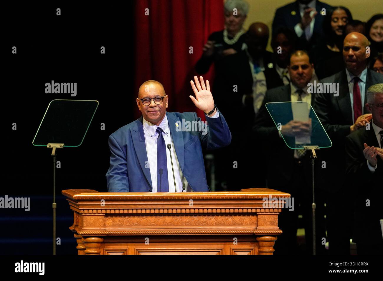 Lieutenant Governor Dale Caldwell waves after taking the oath of office ...