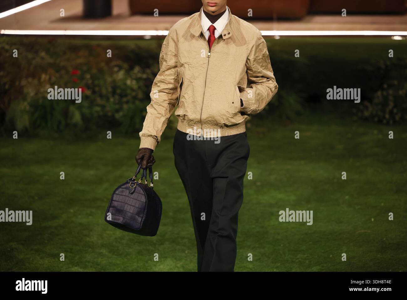 A model wears a creation as part of the Louis Vuitton Fall/Winter 2026 ...