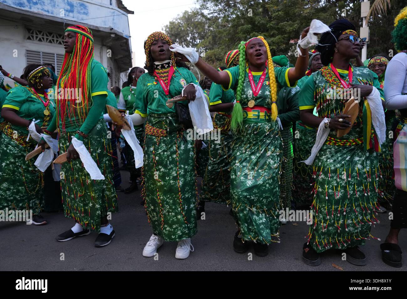 Fans celebrate the Senegalese soccer team's victory in the Africa Cup ...