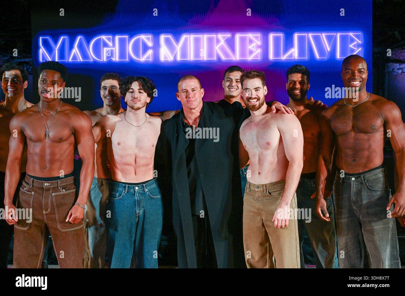 Channing Tatum, center in black, with dancers during a "Magic Mike Live ...
