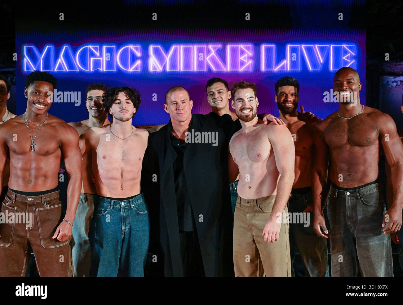 Channing Tatum, center in black, with dancers during a "Magic Mike Live ...