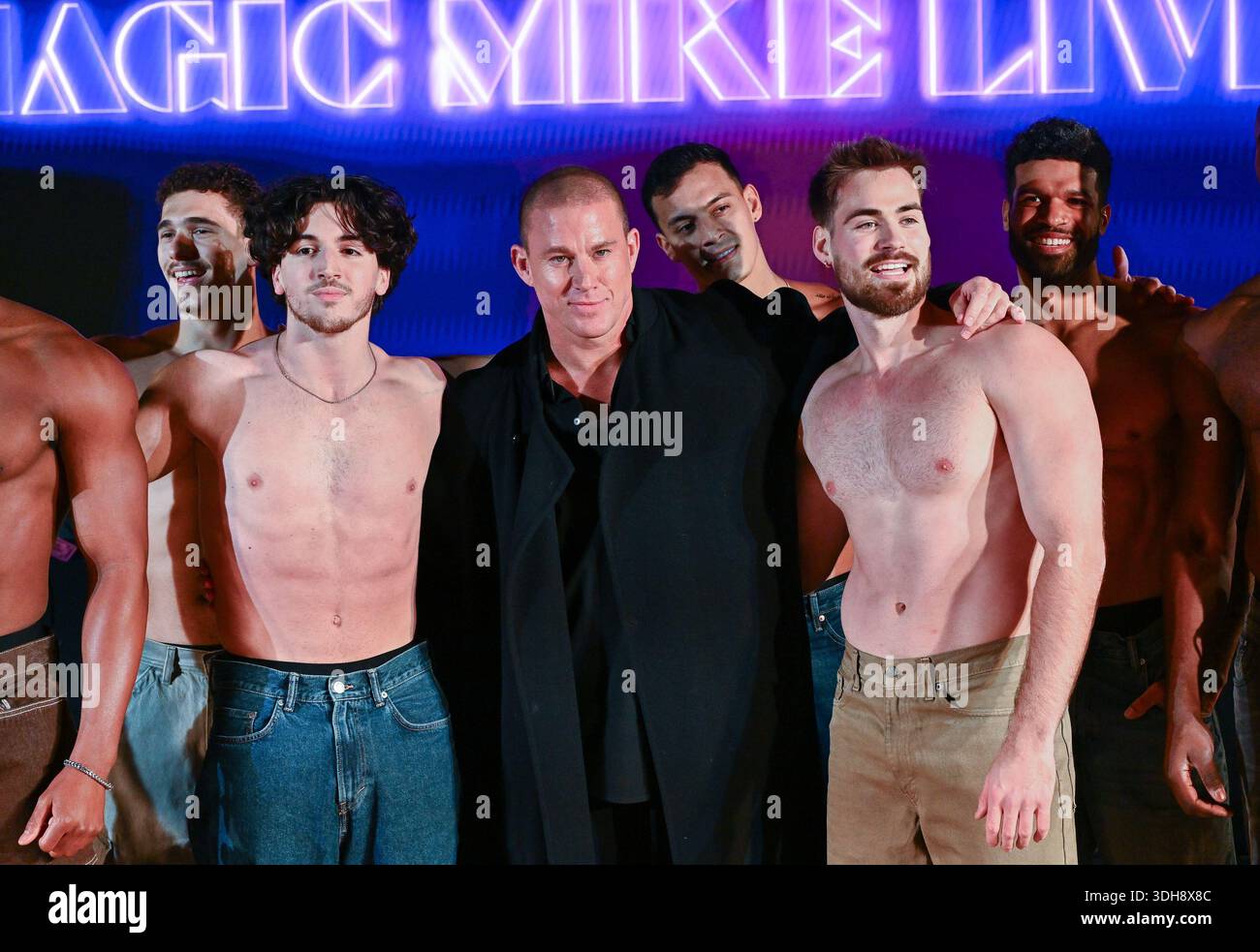 Channing Tatum, center in black, with dancers during a "Magic Mike Live ...
