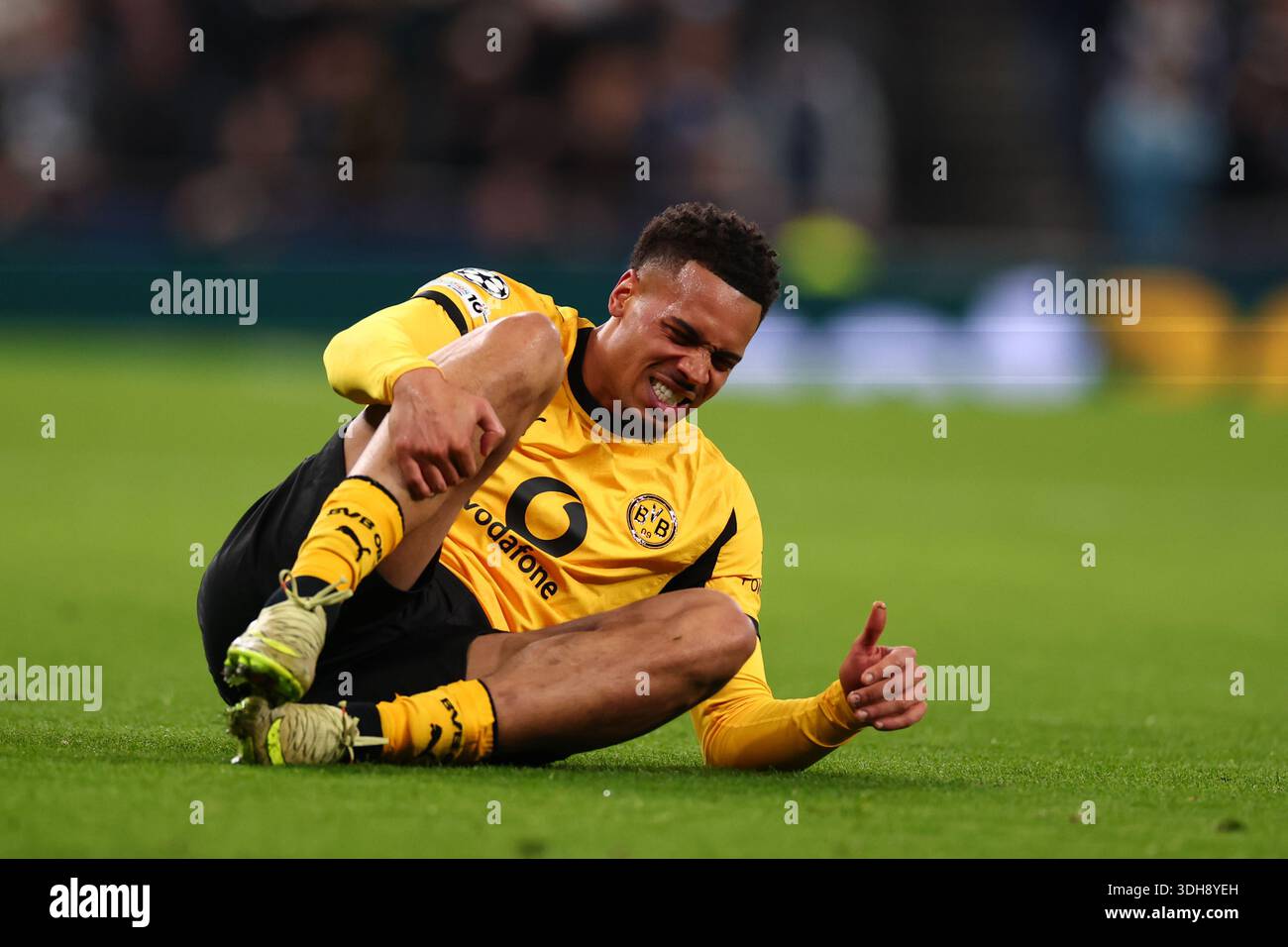 Felix Nmecha of Borussia Dortmund goes down injured - Tottenham Hotspur ...