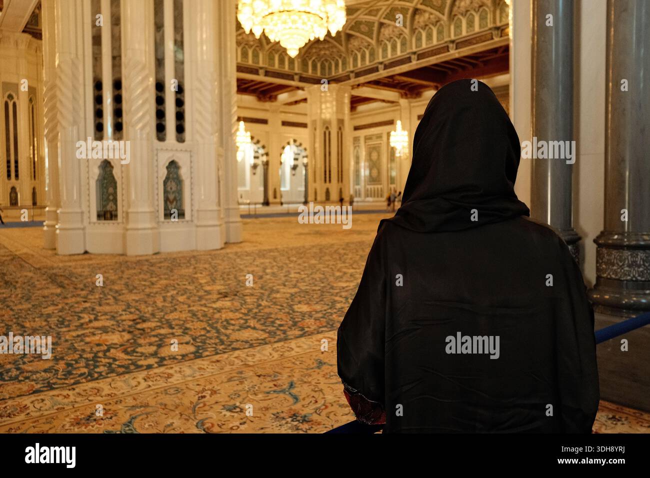 Female tourist wearing headscarf and black clothing in the Sultan ...