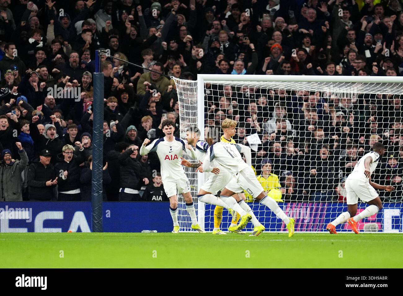 Tottenham Hotspur's Cristian Romero (centre) celebrates with team-mates ...
