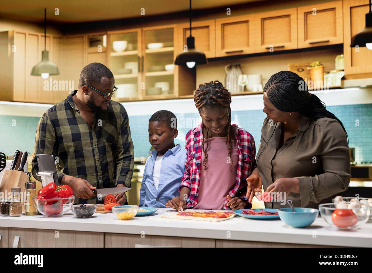 Parents teaching children delicious hi-res stock photography and images ...
