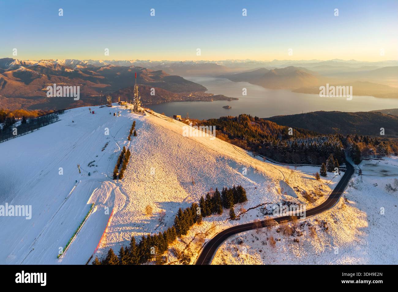 Aerial view of the Mottarone mount during a winter sunrise. Stresa ...
