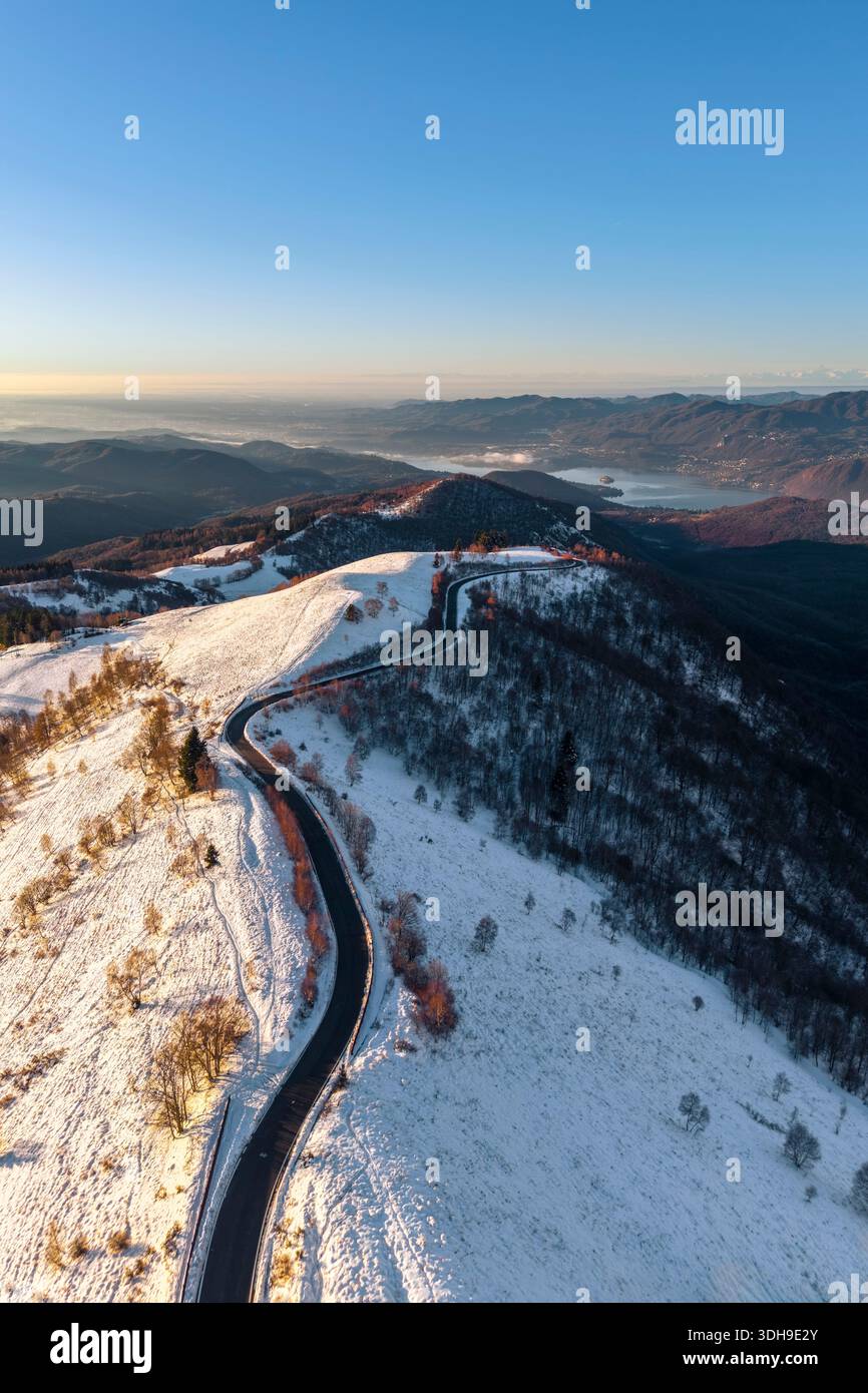 Aerial view of the Mottarone mount during a winter sunrise. Stresa ...