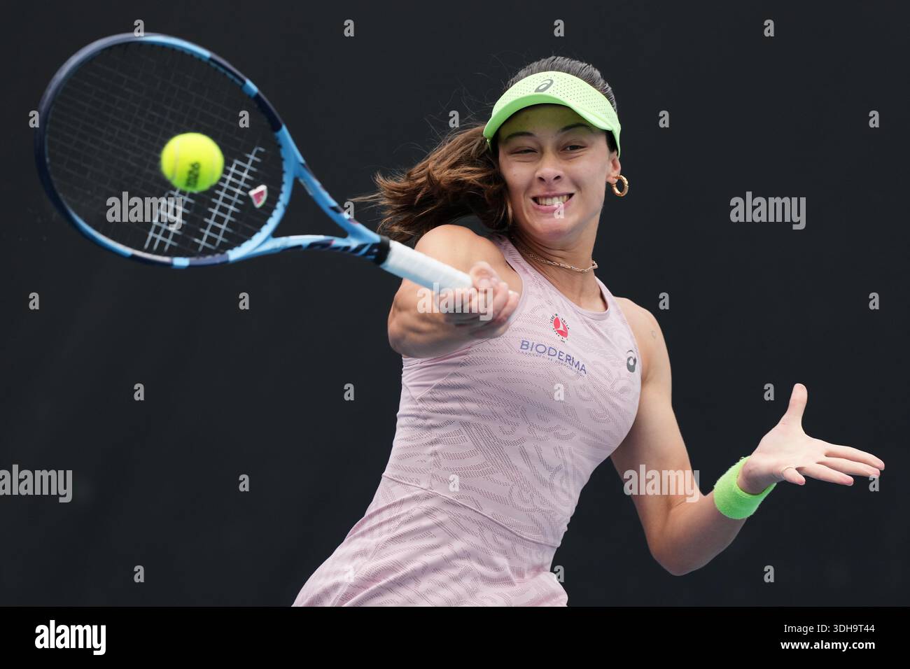 Zeynep Sonmez of Turkey plays a forehand return to Anna Bondar of ...