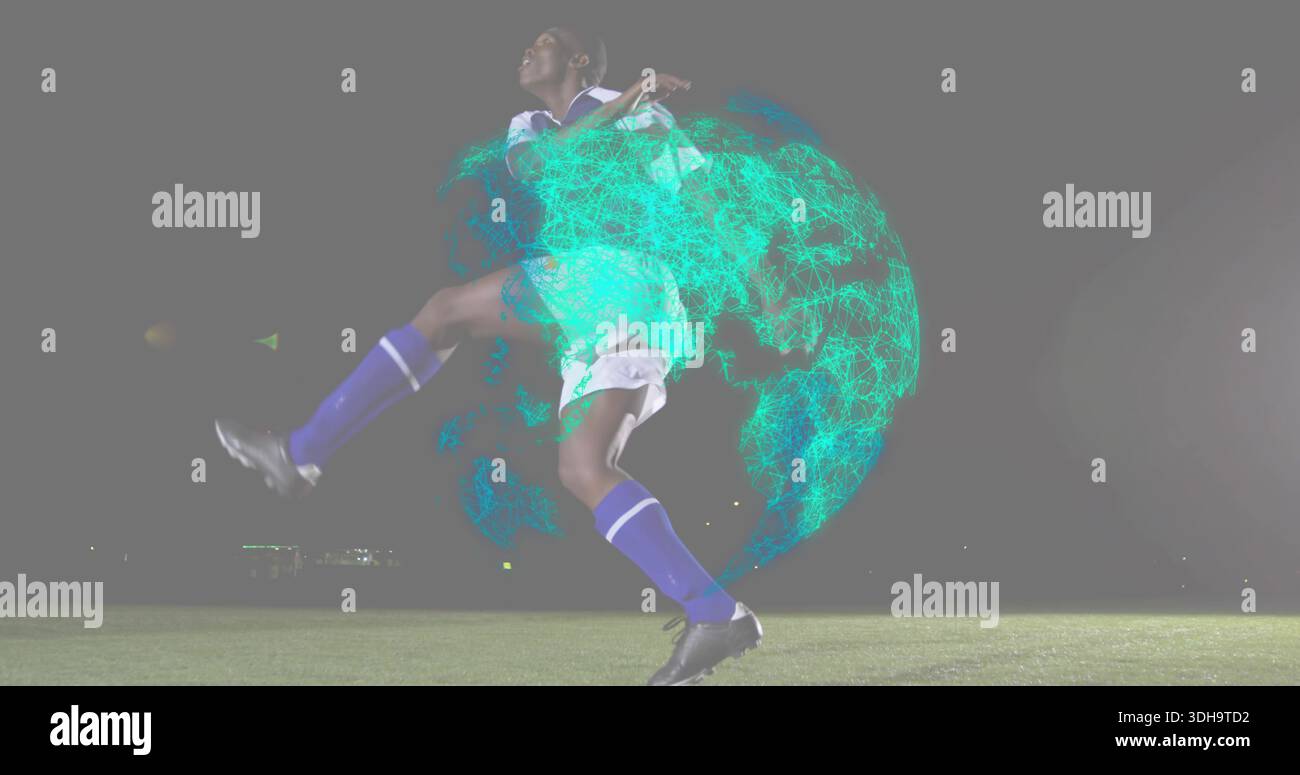 Leaping soccer player in white-blue kit kicking on pitch at night under ...