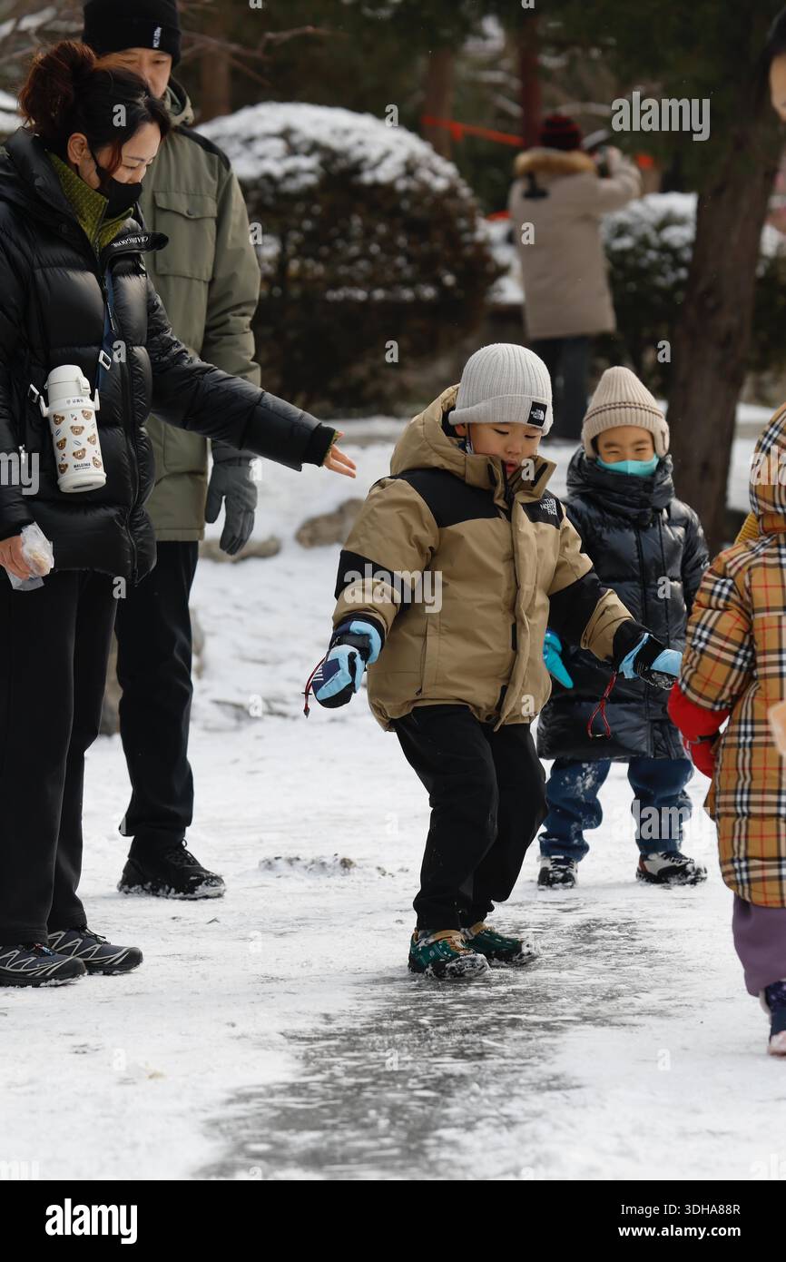 **CHINESE MAINLAND, HONG KONG, MACAU AND TAIWAN OUT**Children enjoy ice ...