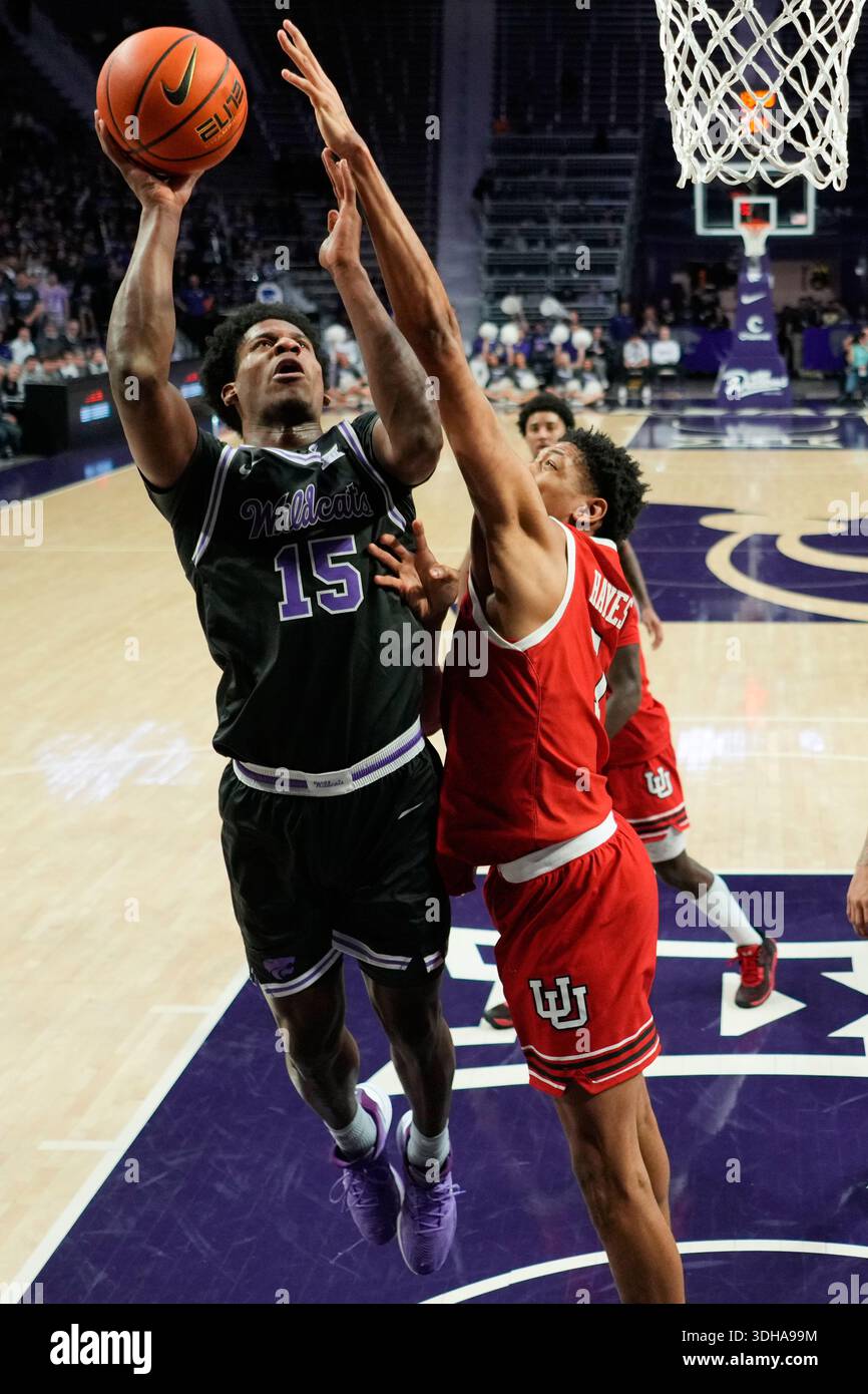 Kansas State forward Taj Manning (15) shoots under pressure from Utah ...