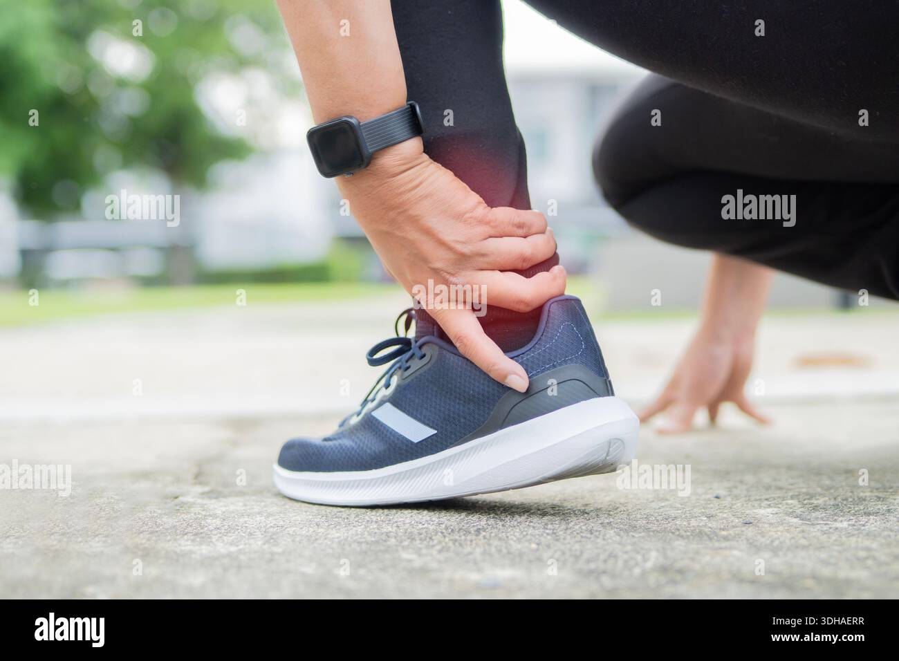 Sport injury, A man has ankle pain during outdoor exercise. Ankle ...