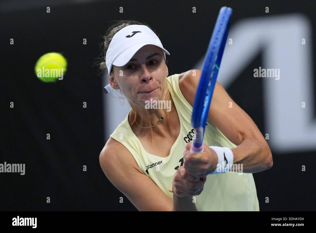 Magda Linette of Poland plays a backhand return to Ann Li of the U.S ...