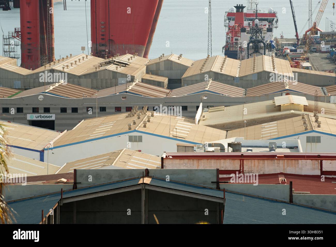 Port activity, stevedores cranes, ships, sea & safe harbour ...