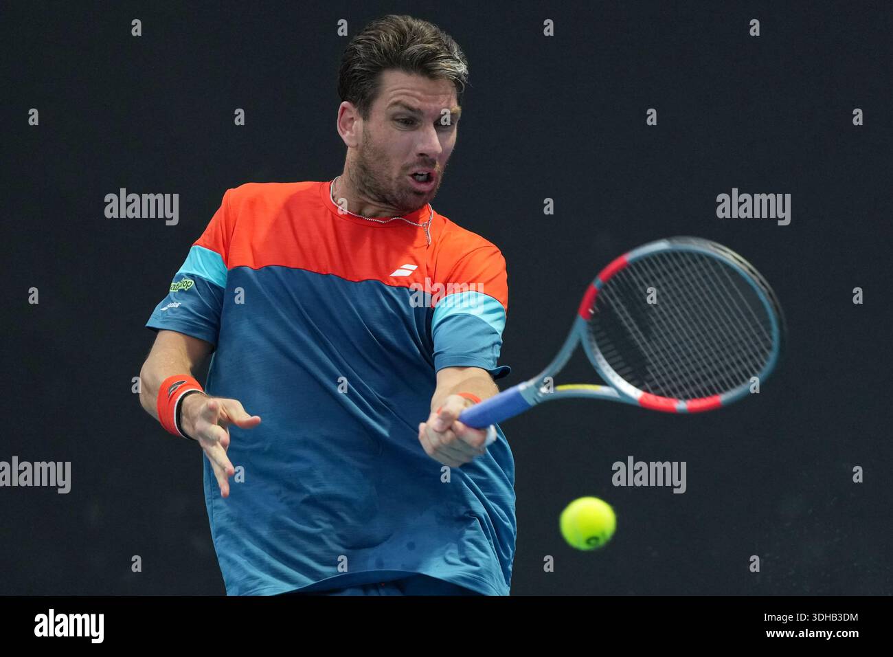 Cameron Norrie of Britain plays a forehand return to- Emilio Nava of ...