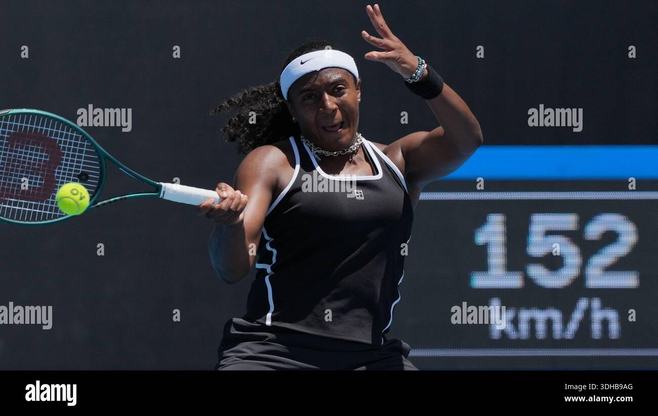 Hailey Baptiste of the U.S. plays a forehand return to Storm Hunter of ...