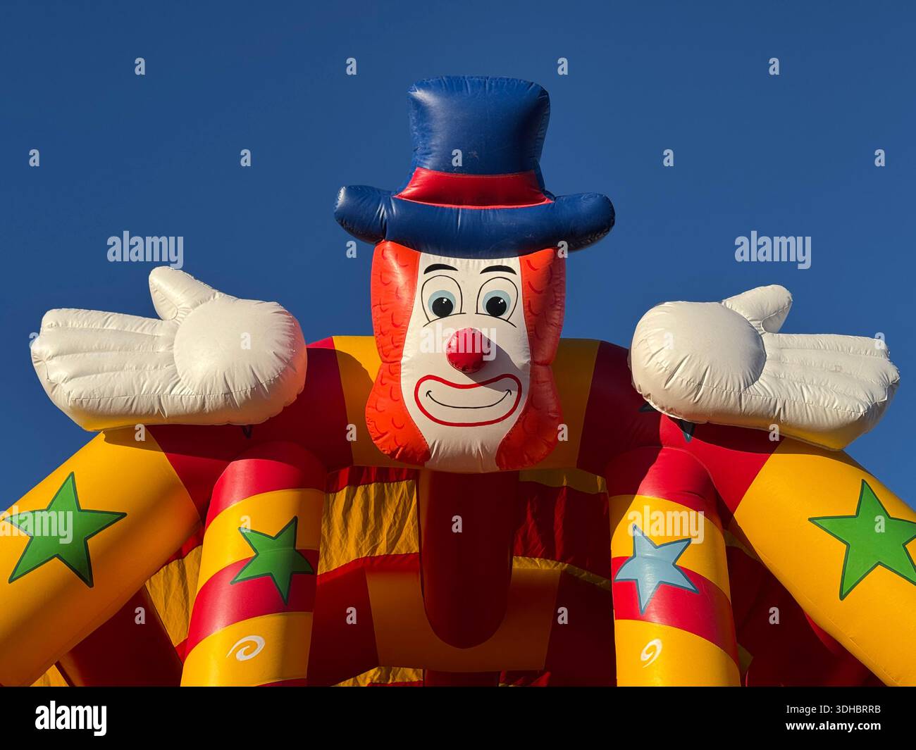 Brightly coloured fairground signs at Barry Island fun fair, South ...