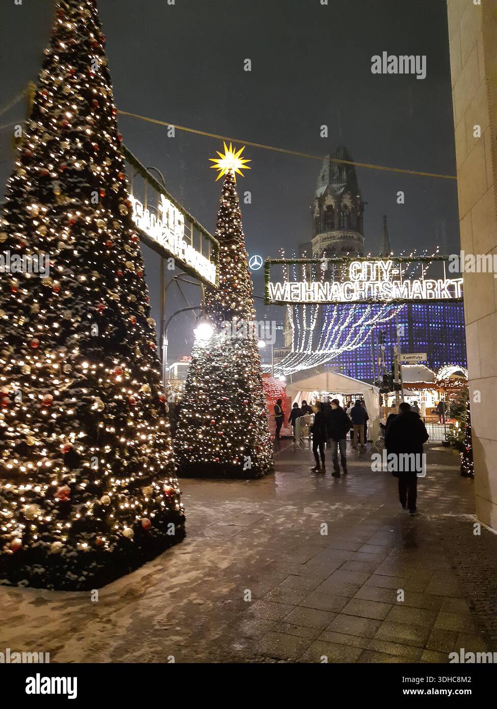 Christmas market at night in Berlin with festive lights Stock Photo - Alamy