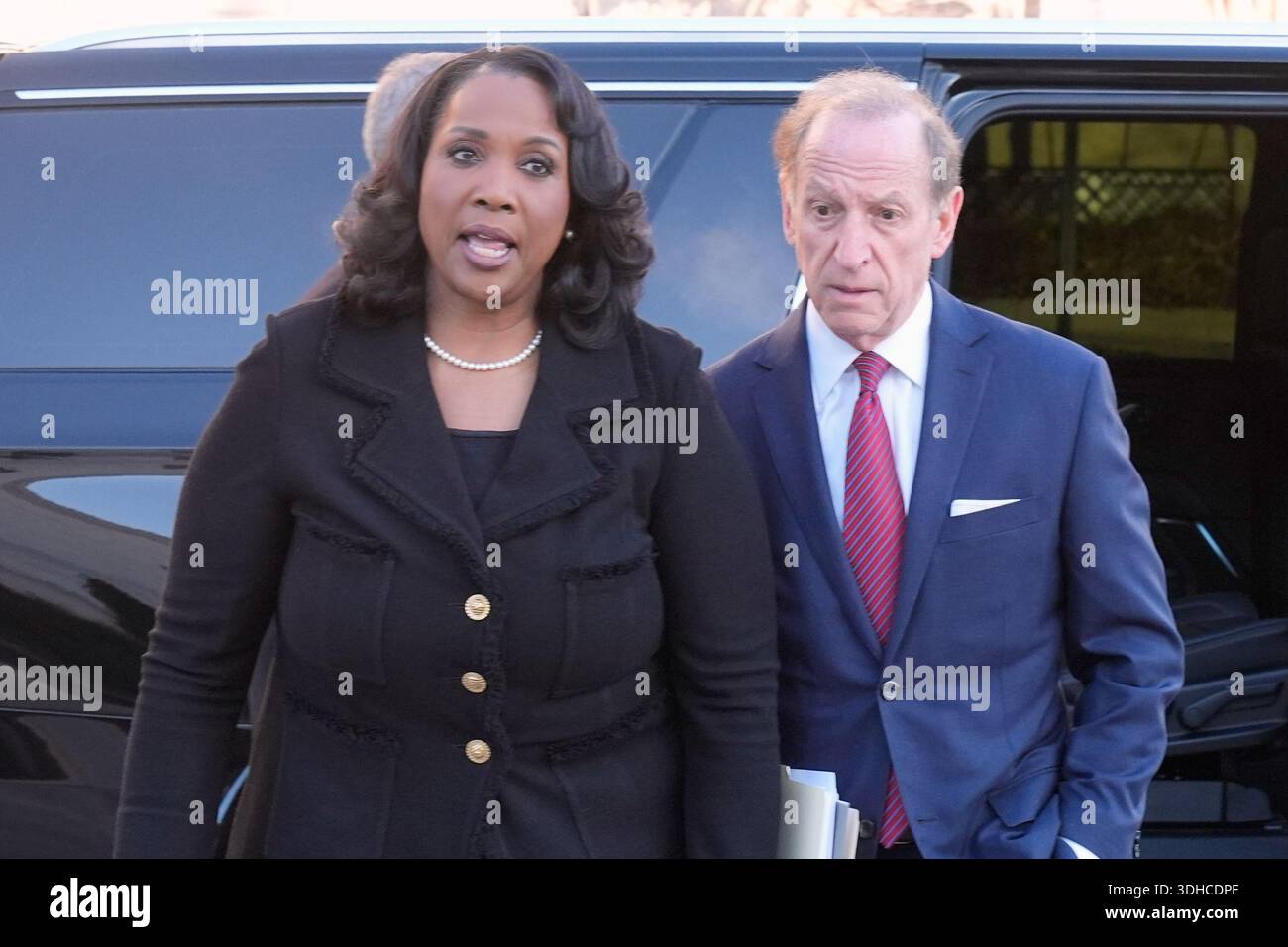 Federal Reserve governor Lisa Cook and attorney Abbe Lowell, arrive at ...