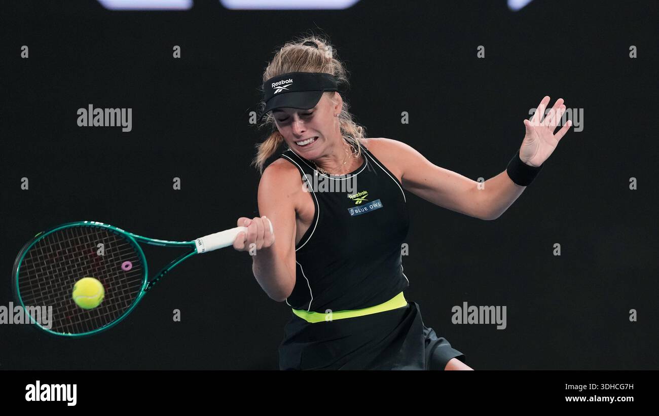 Magdalena Frech of Poland plays a forehand return to Jasmine Paolini of ...