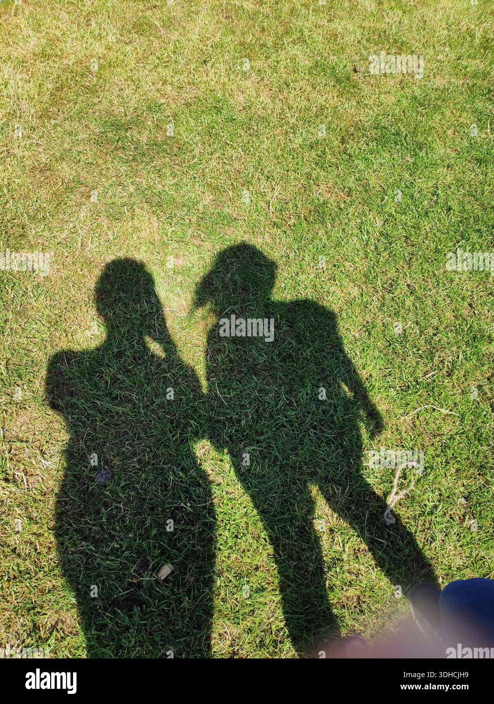 Two standing figures silhouette hi-res stock photography and images - Alamy