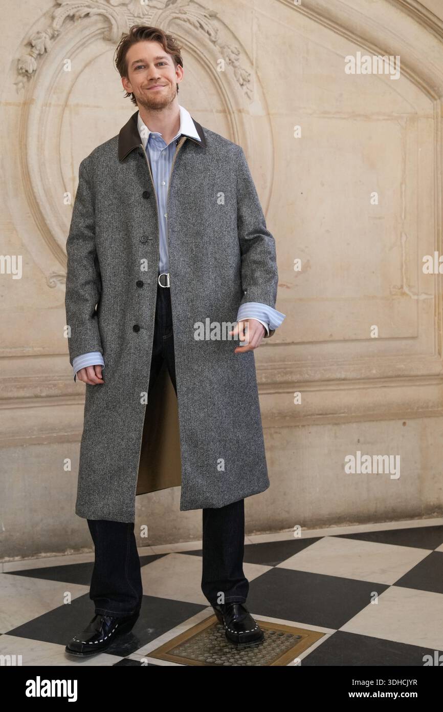 Joe Alwyn poses for photographers at the photo call for the Dior Fall ...