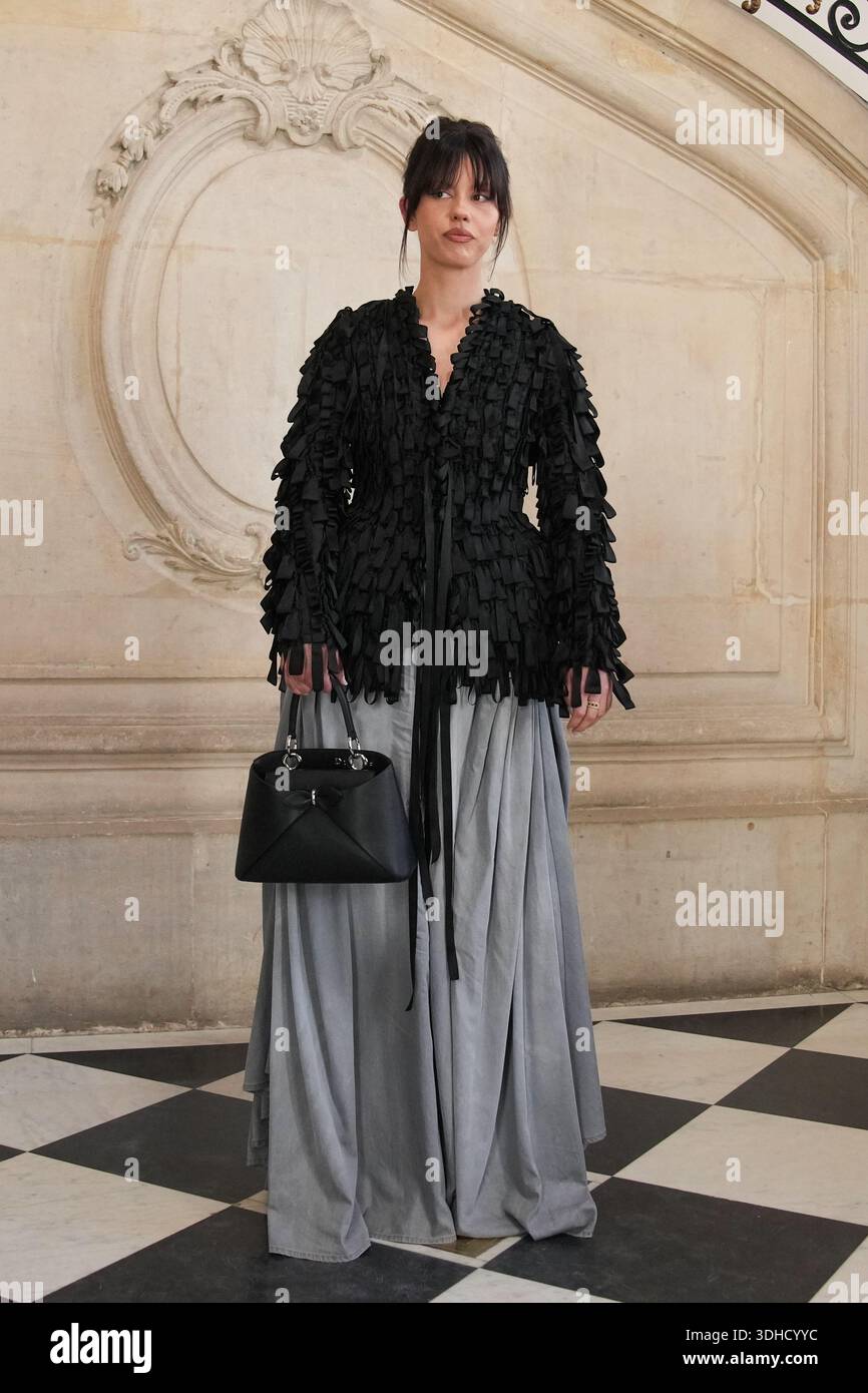 Mia Goth poses for photographers at the photo call for the Dior Fall ...