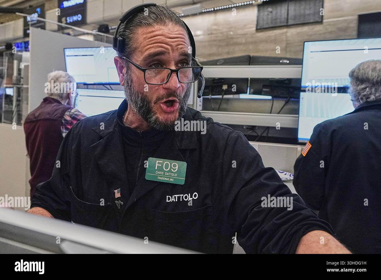 Options trader Chris Dattolo works on the floor of the New York Stock ...