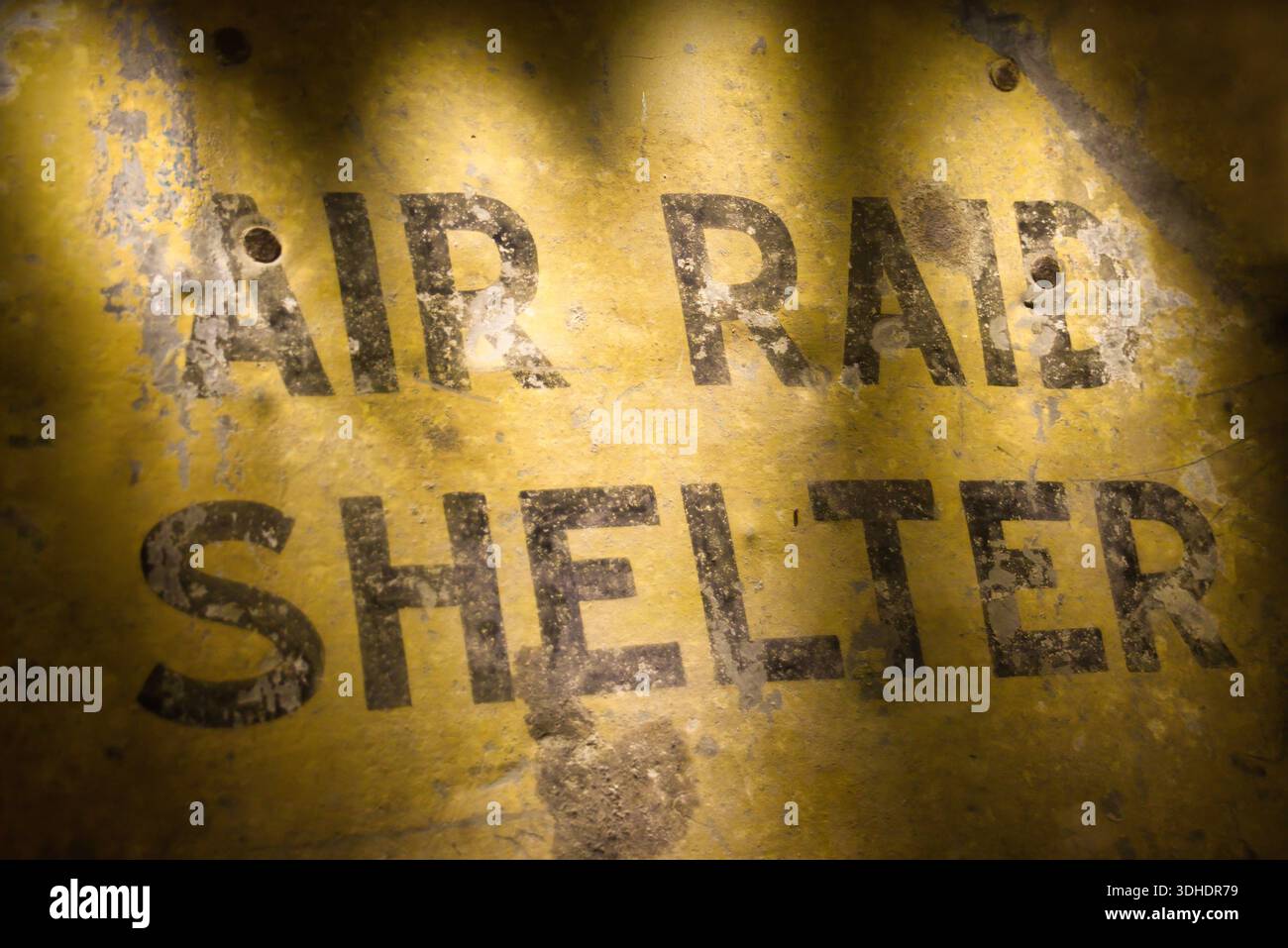 Vintage Air Raid Shelter sign with distressed yellow paint and black ...