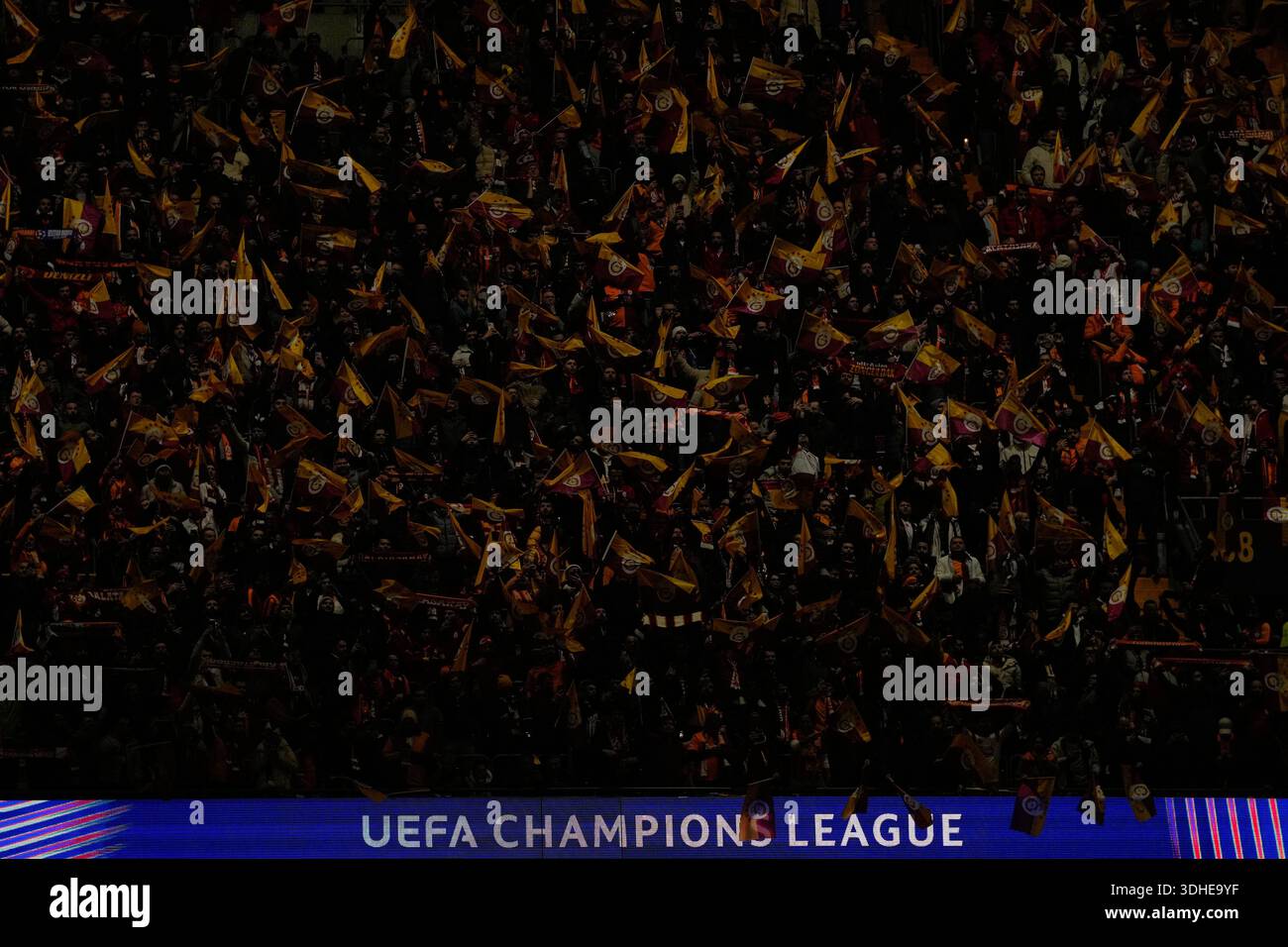 Galatasaray supporters cheer at the stand prior to a Champions League ...