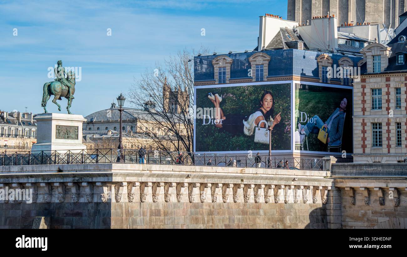 Dior advertising billboards covering the facade of a Parisian building ...