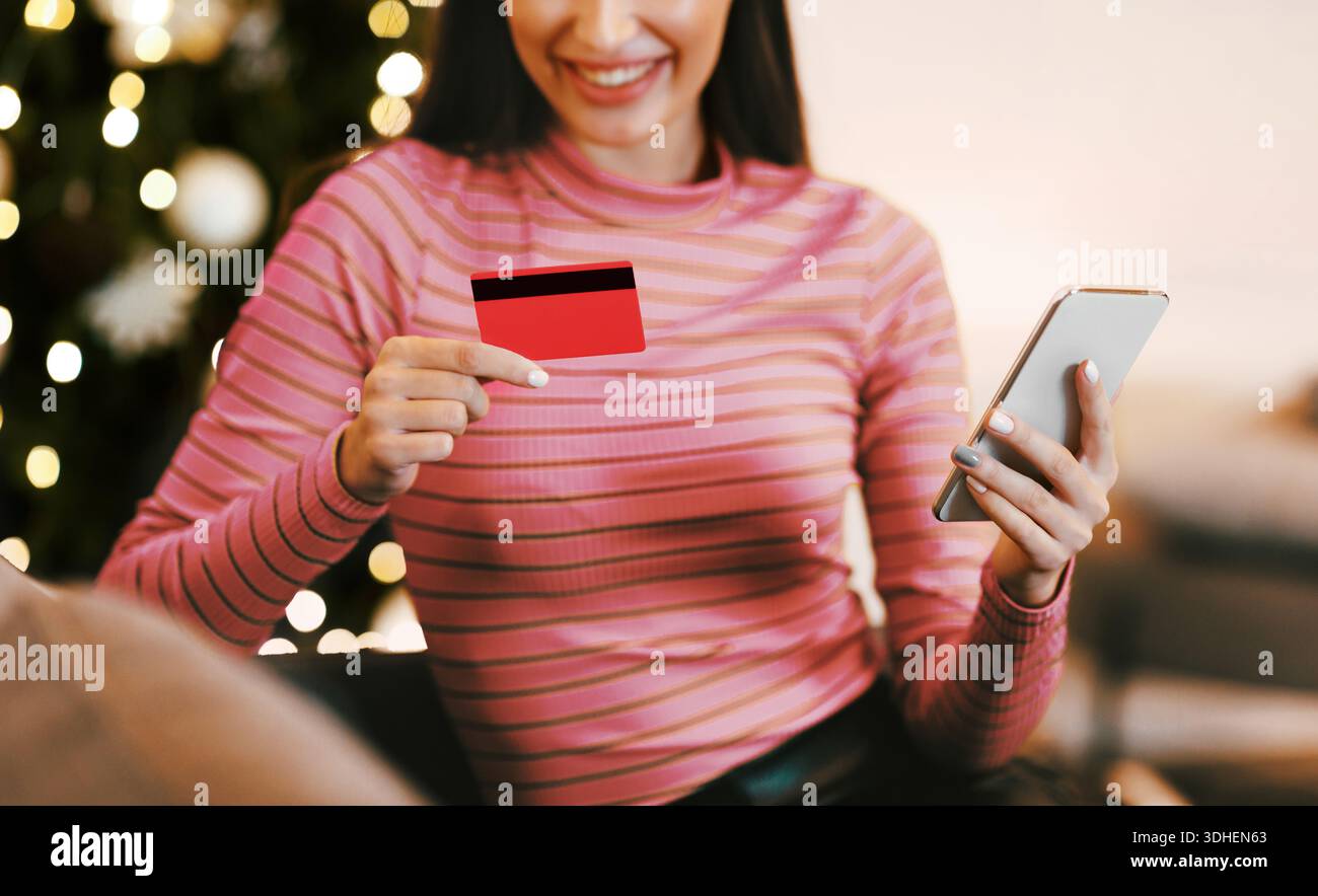 Happy festive lady using hi-res stock photography and images - Alamy