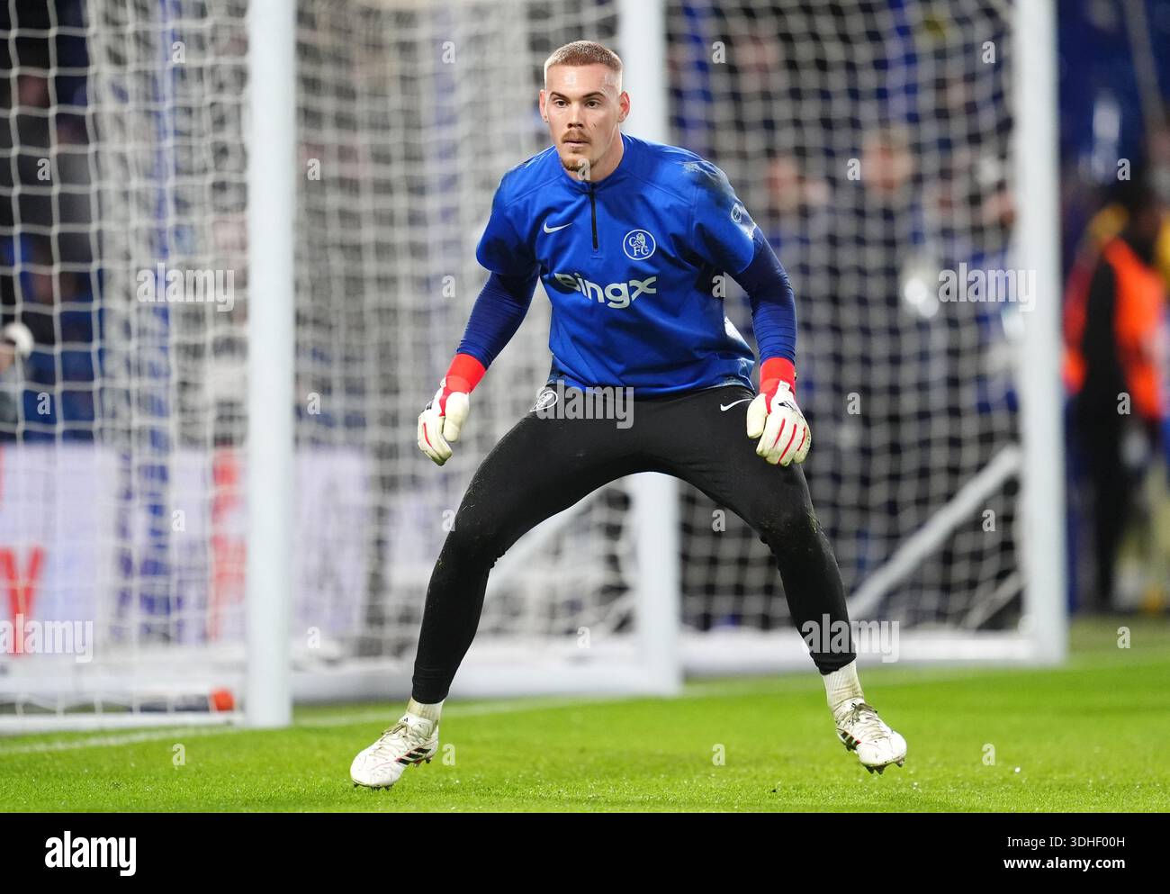 Chelsea goalkeeper Filip Jorgensen warming up prior to kick-off before ...